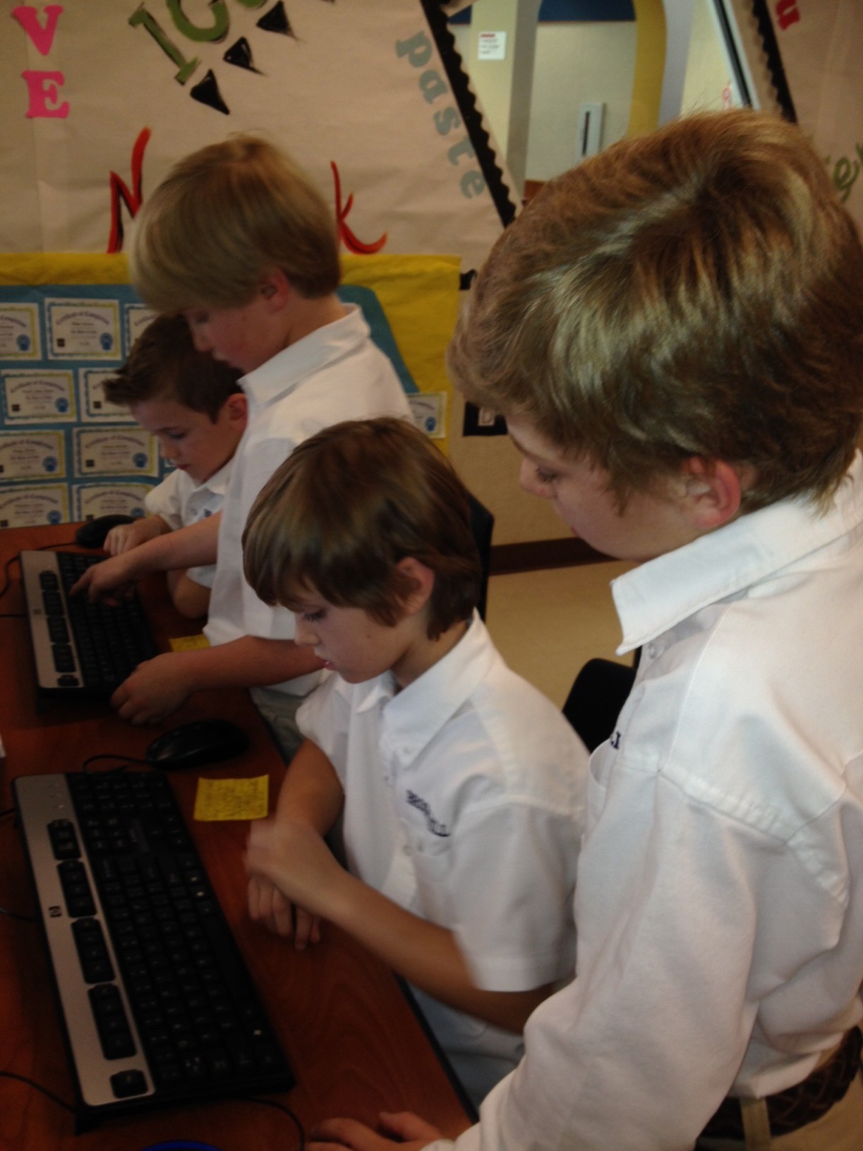 Fourth Graders Assist First Grade Friends in The Lower School Computer ...
