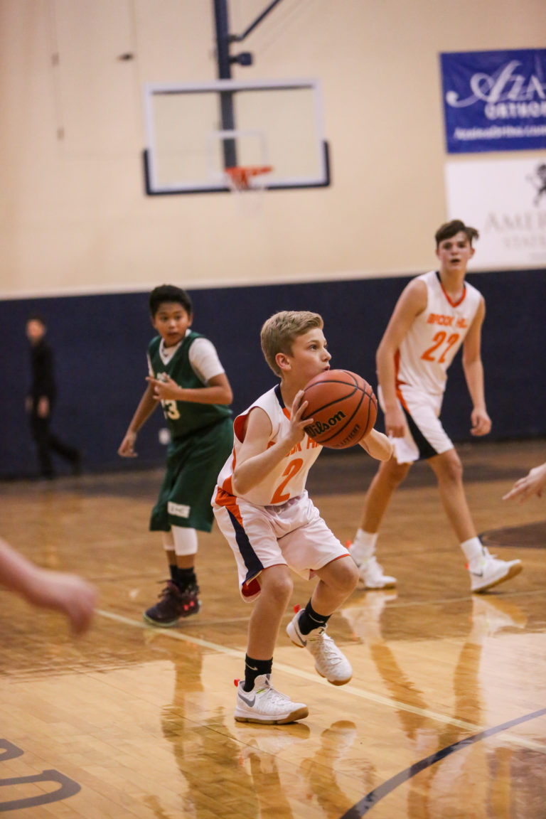 7th and 8th grade boys dribble into basketball season - The Brook Hill ...