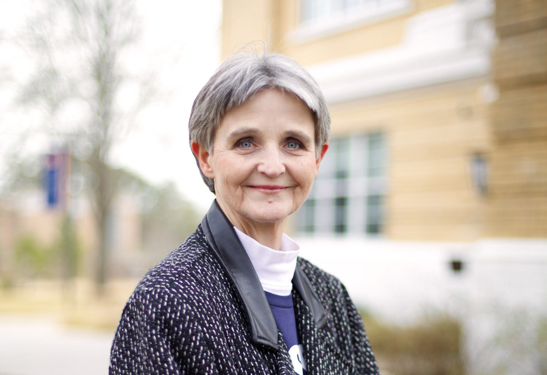 A binder, dividers and a hole punch - The Brook Hill School